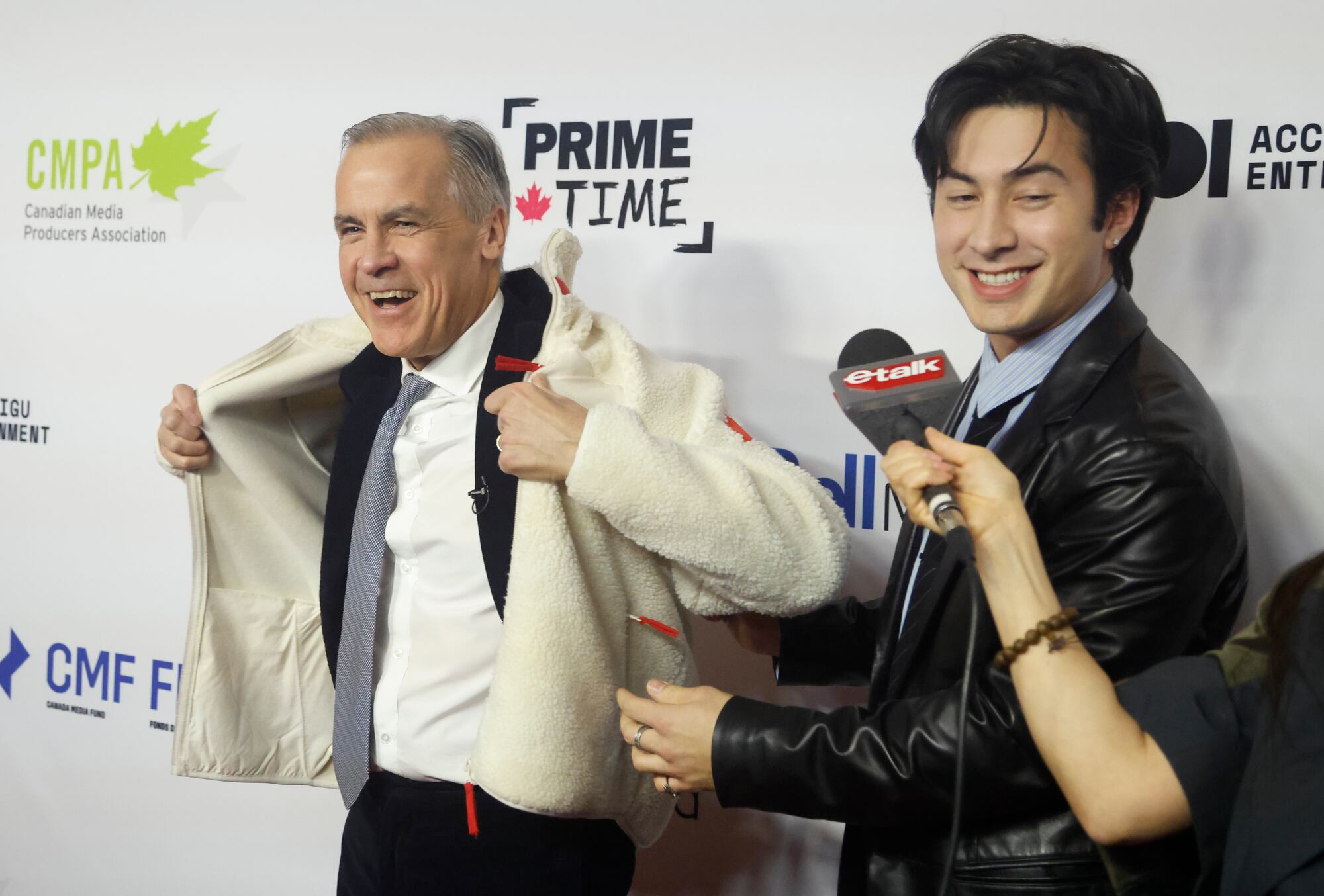'Heated Rivalry' star Hudson Williams and PM Carney hit the red carpet ...