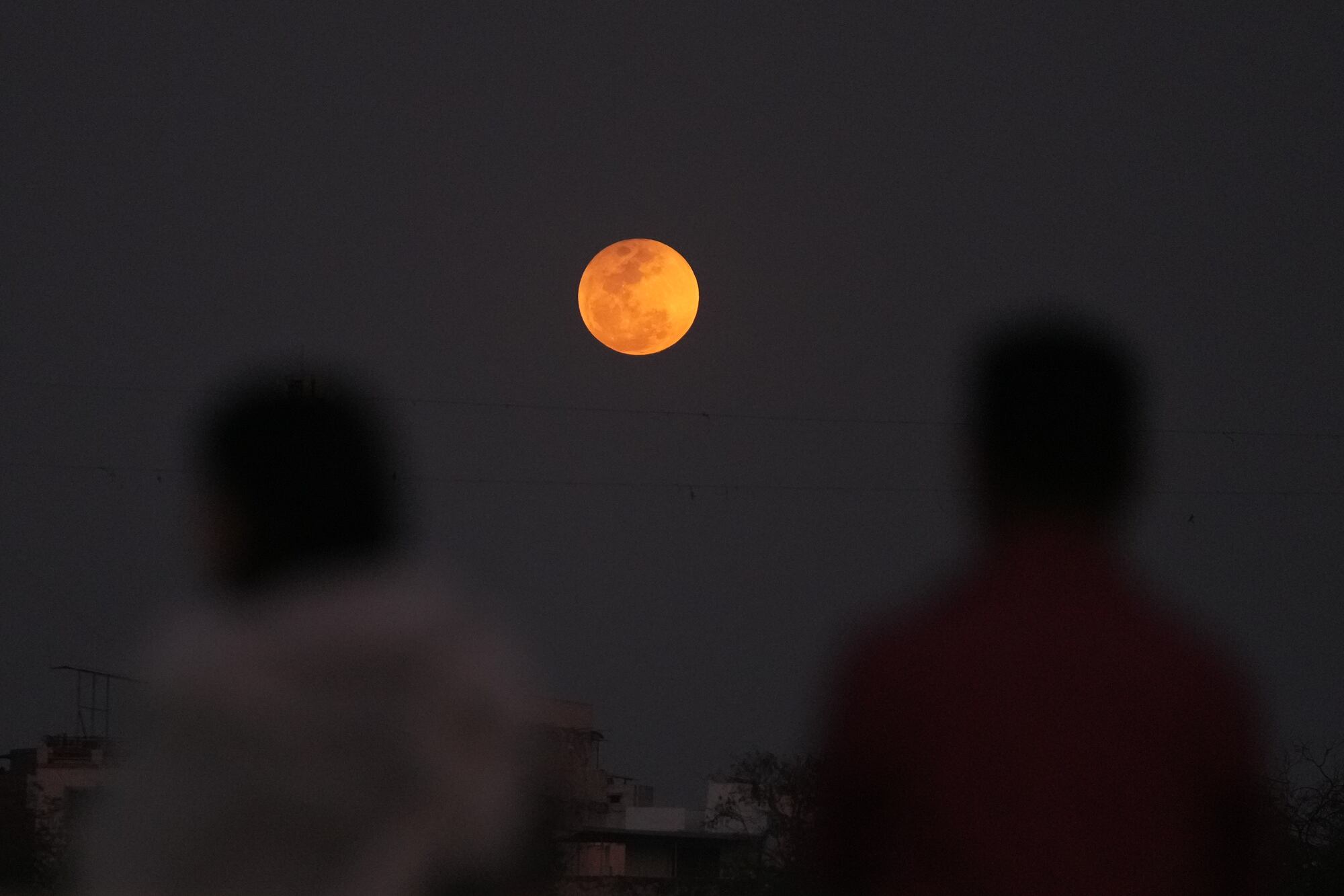 IN PHOTOS: Skywatchers around the world witness rare blood moon – CTVNews